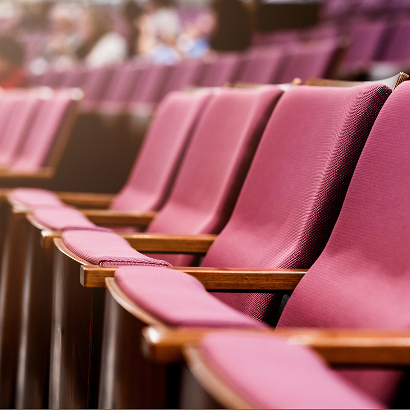 close up theater seat in theater hall auditorium | Art Access Utah