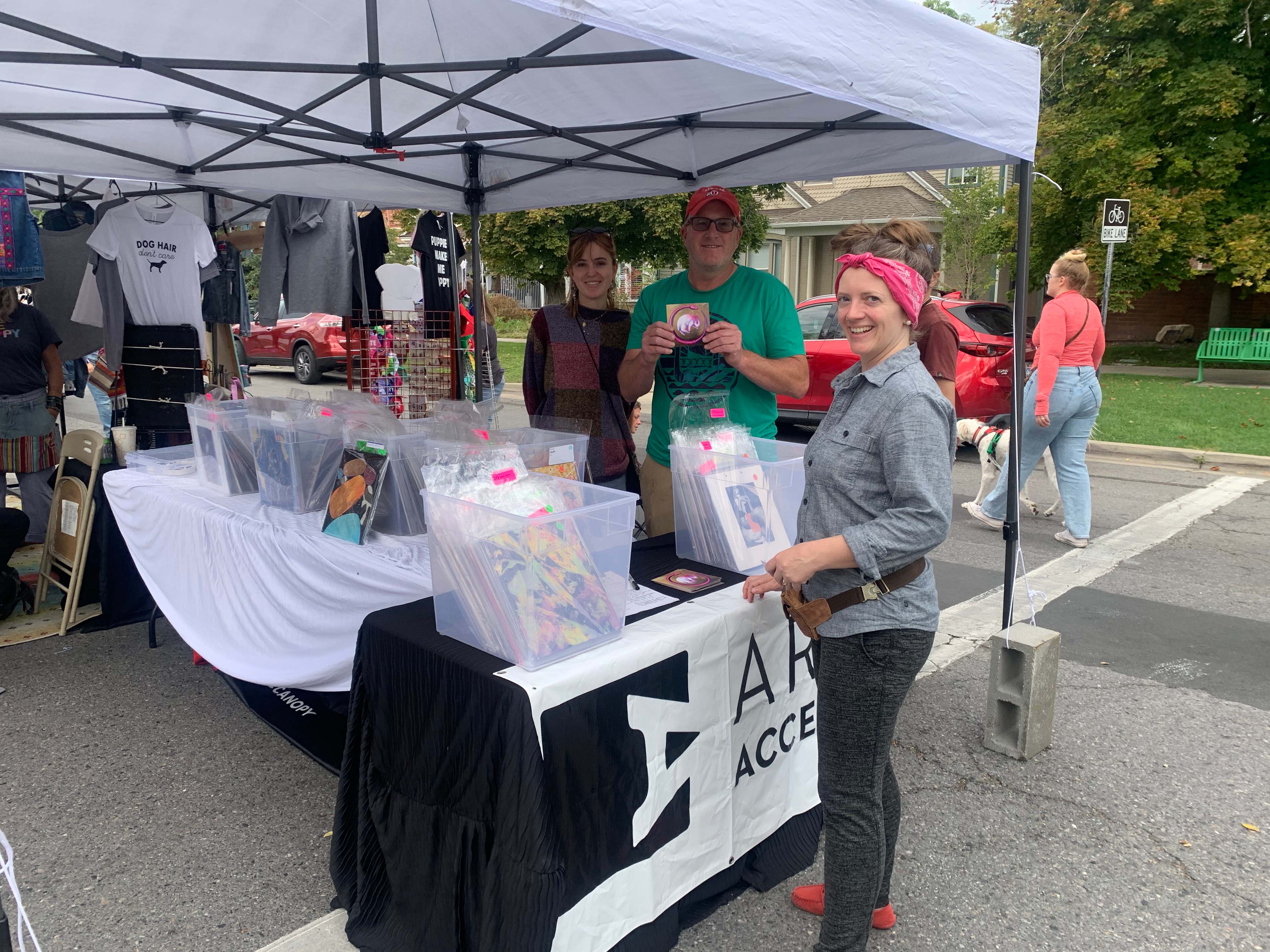 Cara Jean and volunteers at outreach booth | Art Access Utah